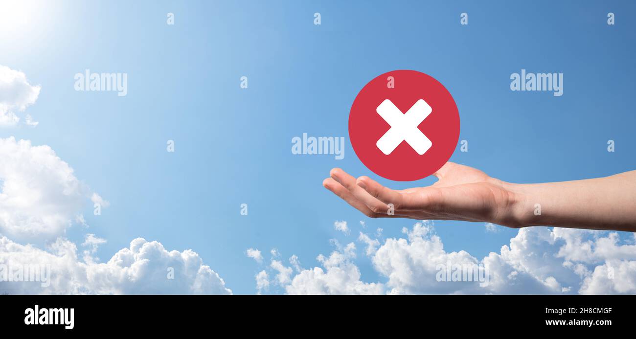 Hand holds icon,cancellation symbol,cancel icon.Cross mark flat red ...
