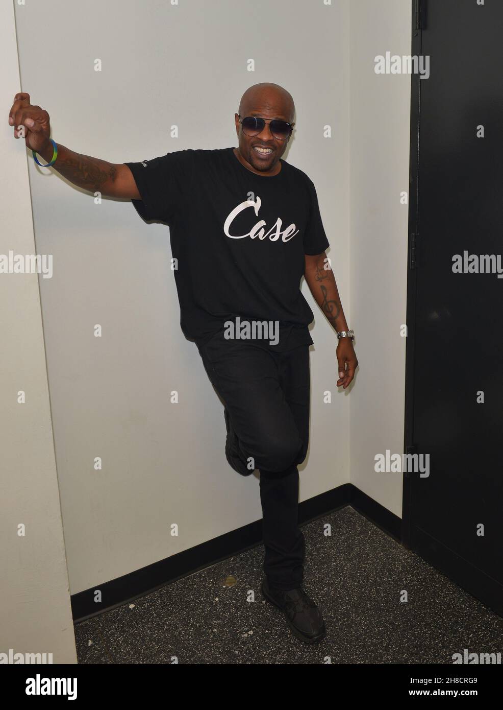 R&B singer Case poses for picture backstage during the 90's Kickback ...
