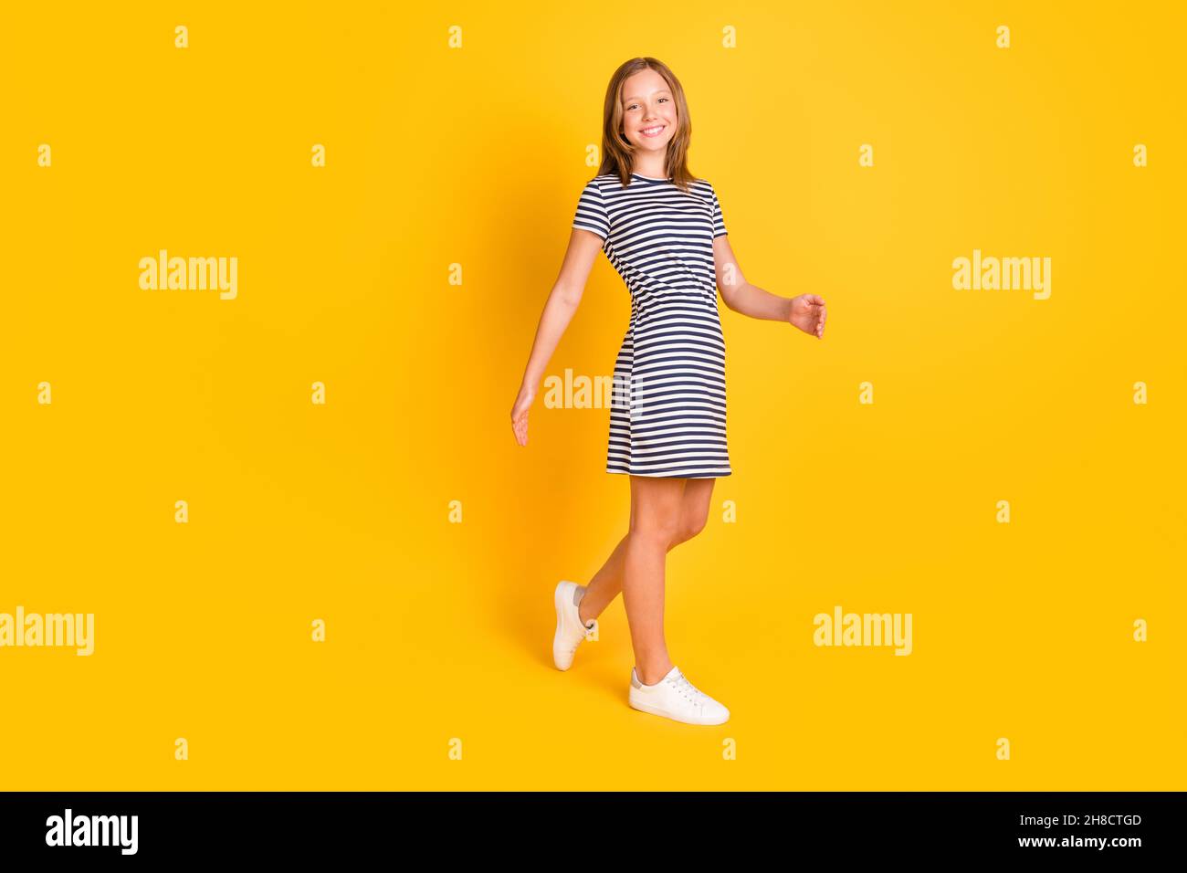Full body profile photo of pretty positive person walking beaming smile ...