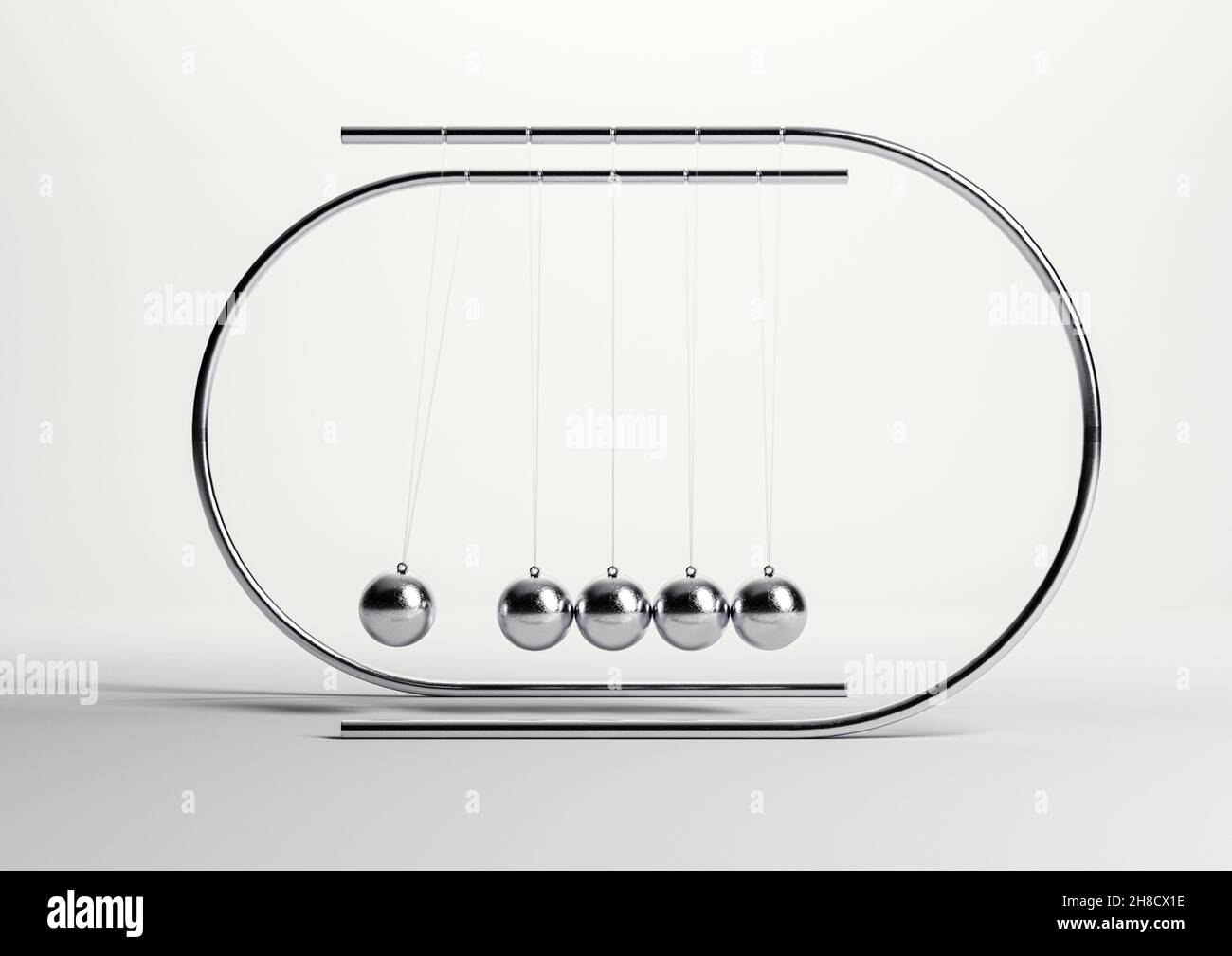 A stylized newtons cradle with balls in motion suspended from a semi ...
