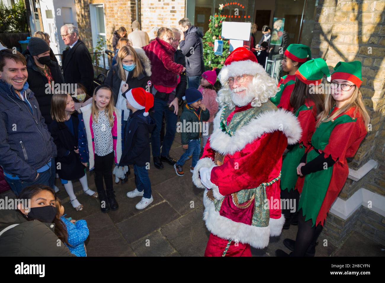 Child and santa grotto hi-res stock photography and images - Alamy