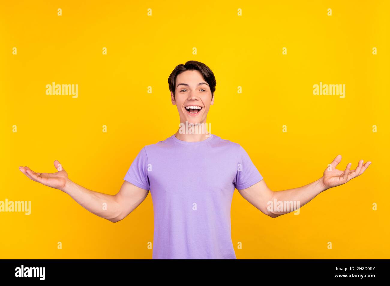 Photo of excited friendly funky guy open mouth wow reaction wear purple ...