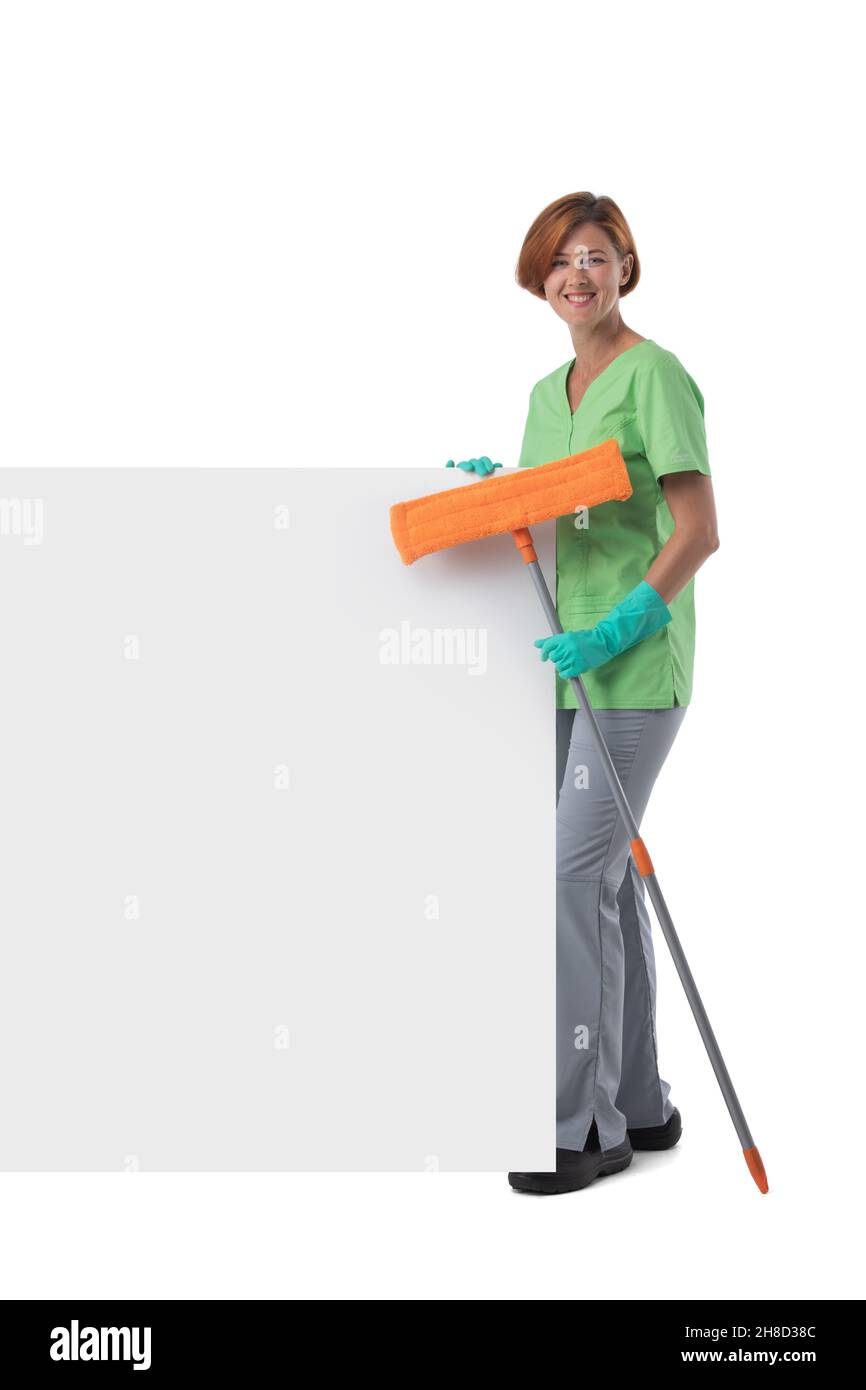 Cleaner woman with mop and blank banner isolated on white background ...