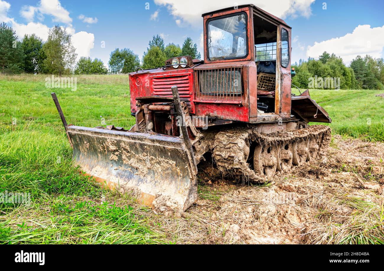 Old skidder at the outdoors in summertime. Skidding machine for timber ...