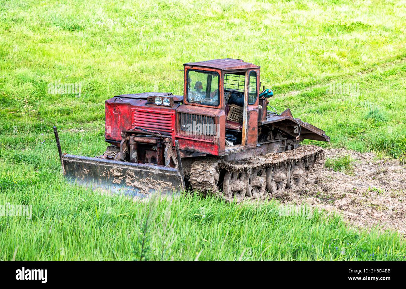 Old skidder at the outdoors in summertime. Skidding machine for timber ...