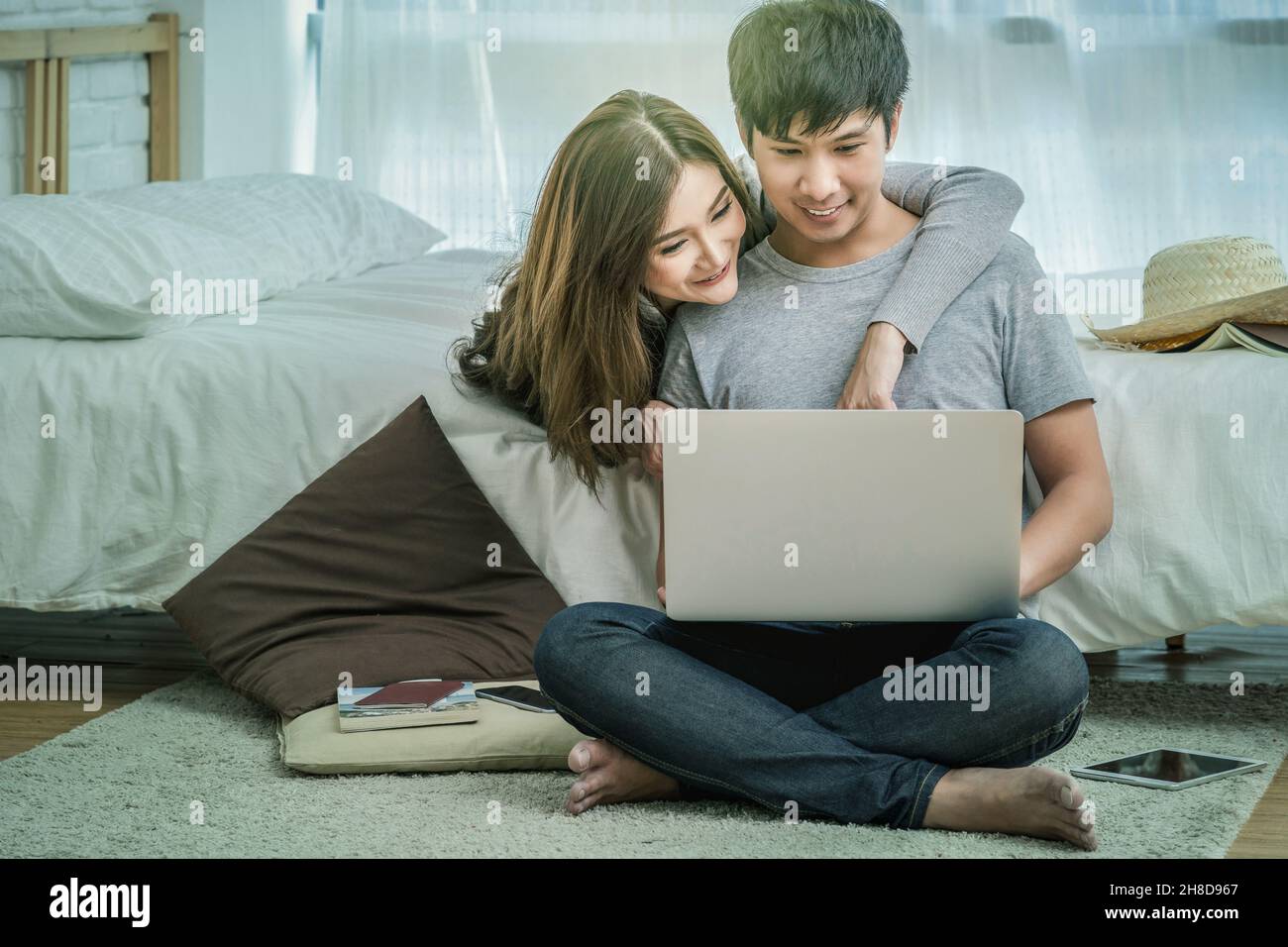 Closeup Happy Asian Lover or couple talking and smiling when using ...