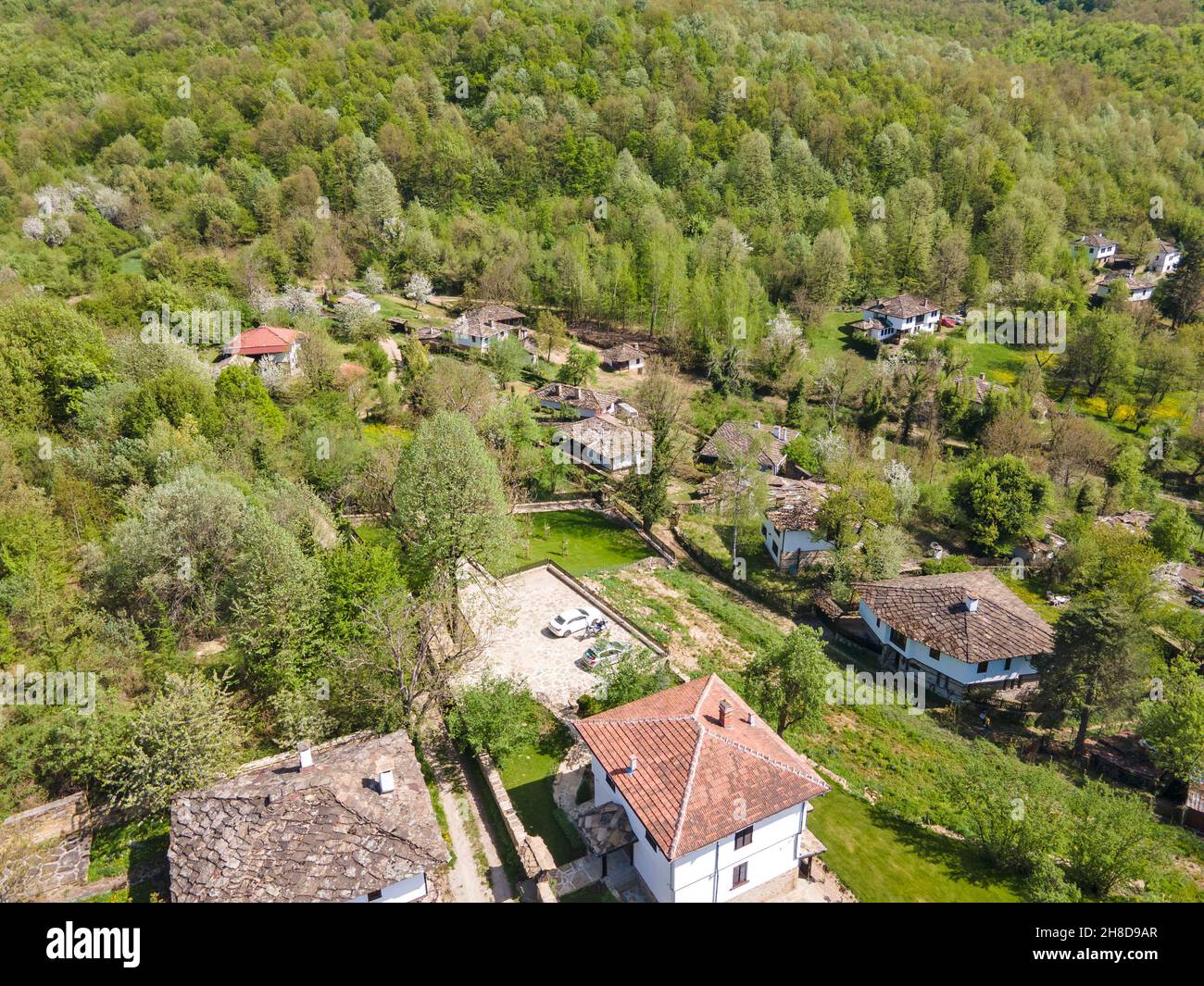 Aerial Spring view of village of Bozhentsi, Gabrovo region, Bulgaria ...
