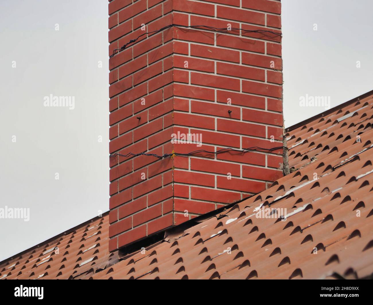 Brick chimney stack on the modern contemporary house rooftop Stock ...