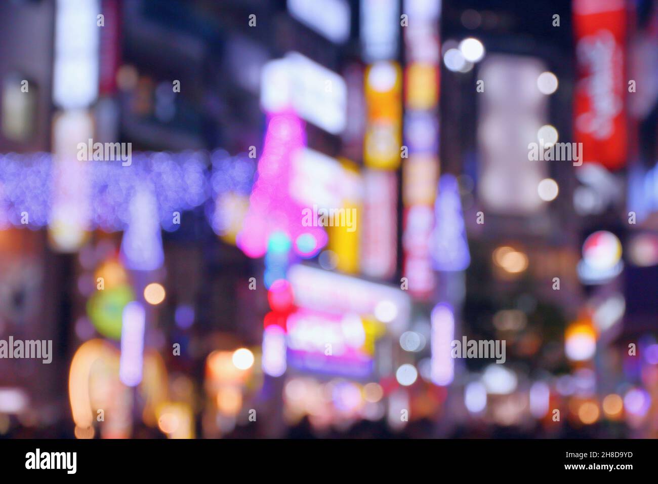 Big city night blurry view. Tokyo, Japan night neons. Defocused ...
