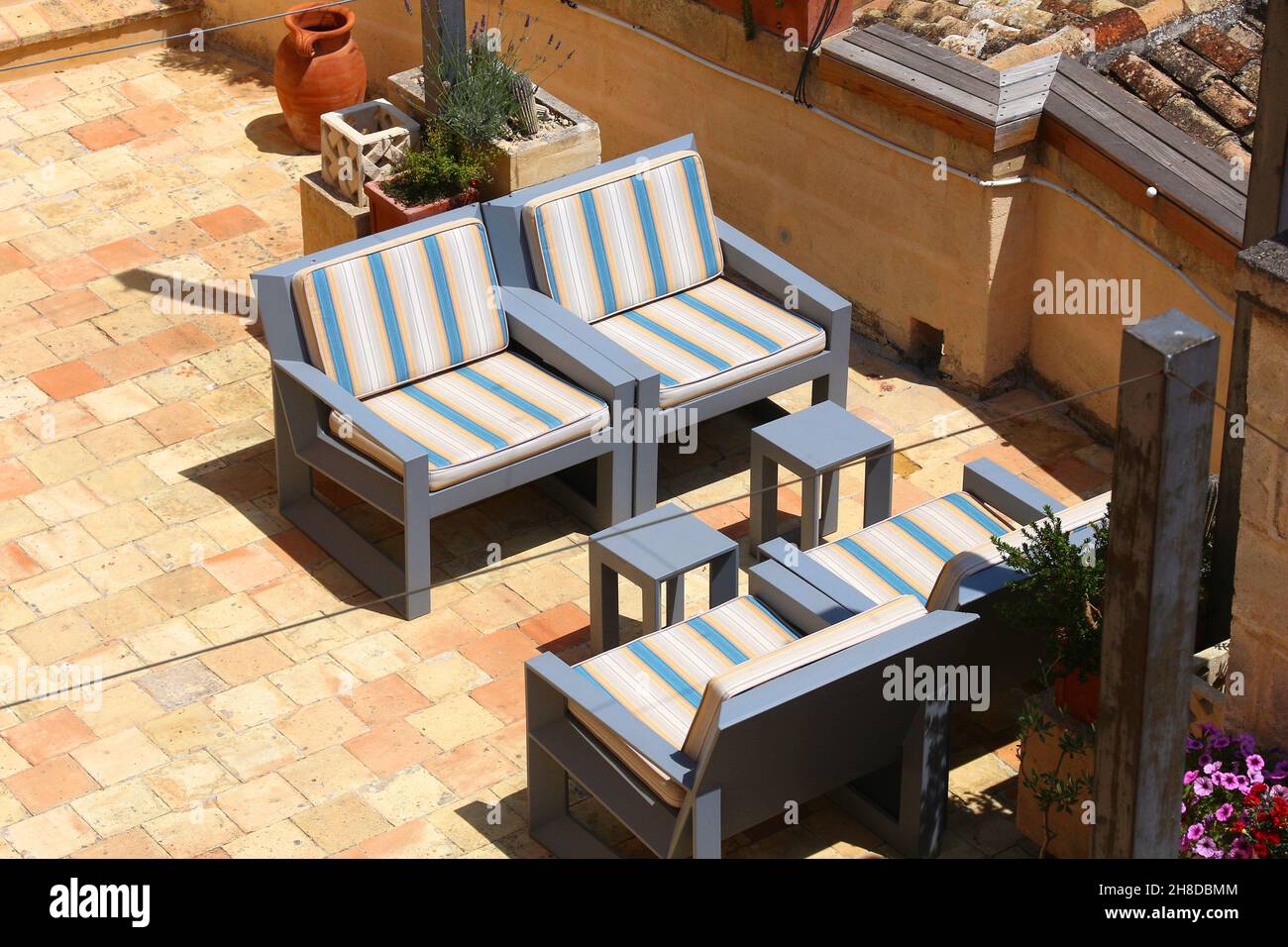 Italian cafe in Matera, Italy. Outdoor chairs and tables Stock Photo ...