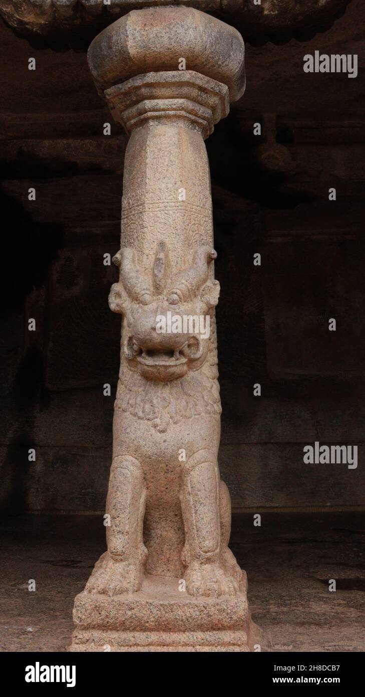 Lion-shaped stone pillar carved into the rock Stock Photo - Alamy