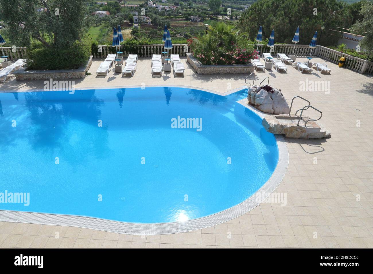 GARGANO, ITALY - JUNE 6, 2017: Generic hotel pool at Gargano Peninsula ...