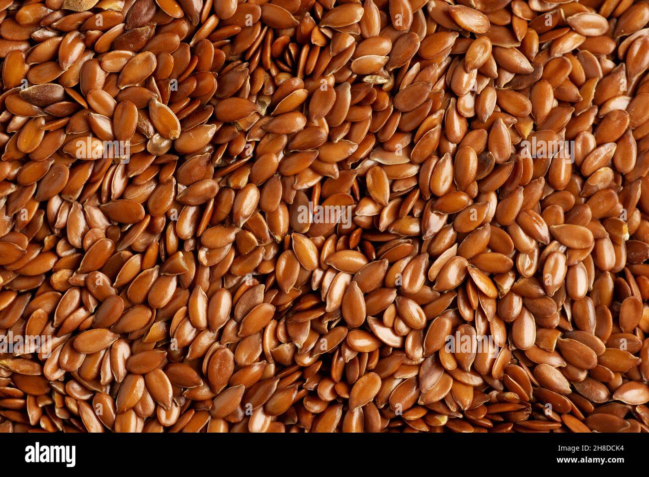 flax seeds as a background close up Stock Photo - Alamy