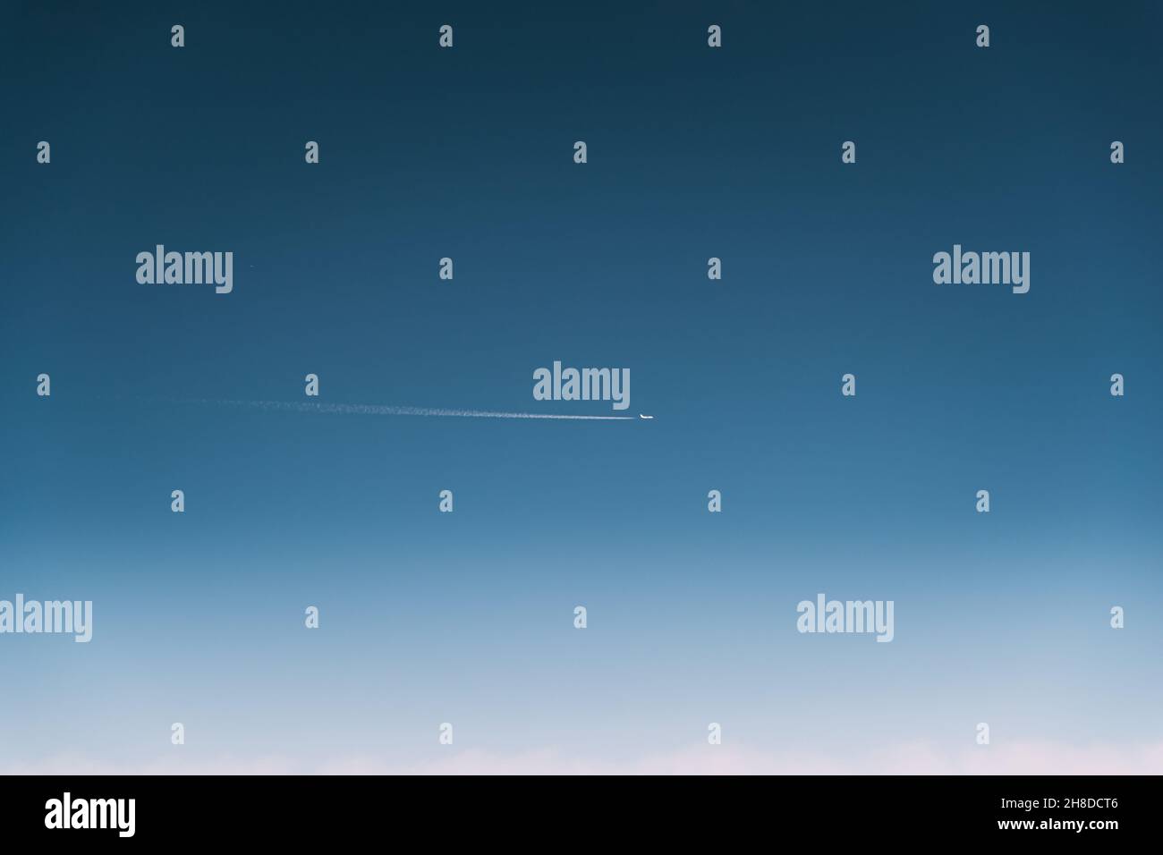 Contrail In Blue Sky. Plane In Sunny Sky. Aircraft In Sky With Plane ...