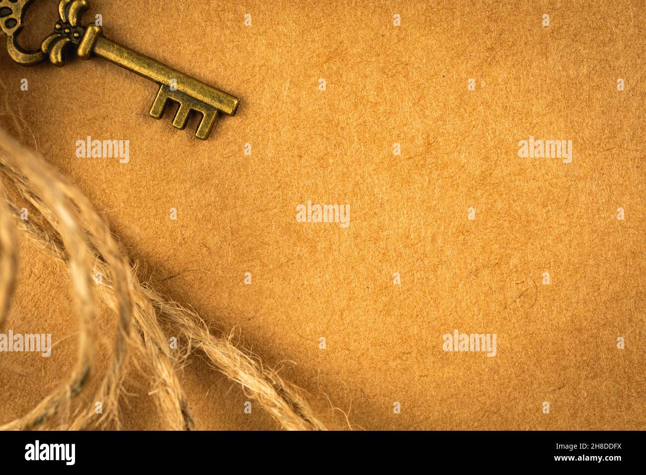 Treasure map paper with bronze key, old grunge texture background ...