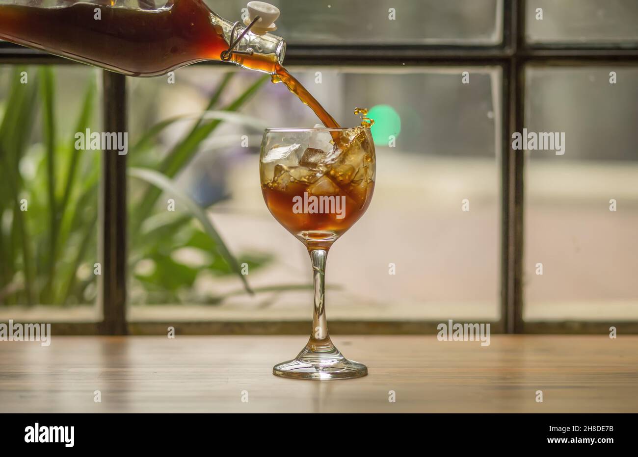 Barman pouring ice cubes hi-res stock photography and images - Alamy