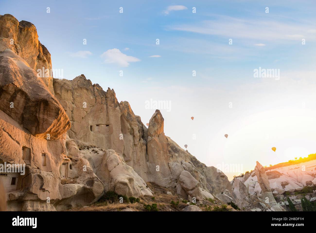 Morning sun over caves in rocks of Cappadocia, Turkey Stock Photo - Alamy