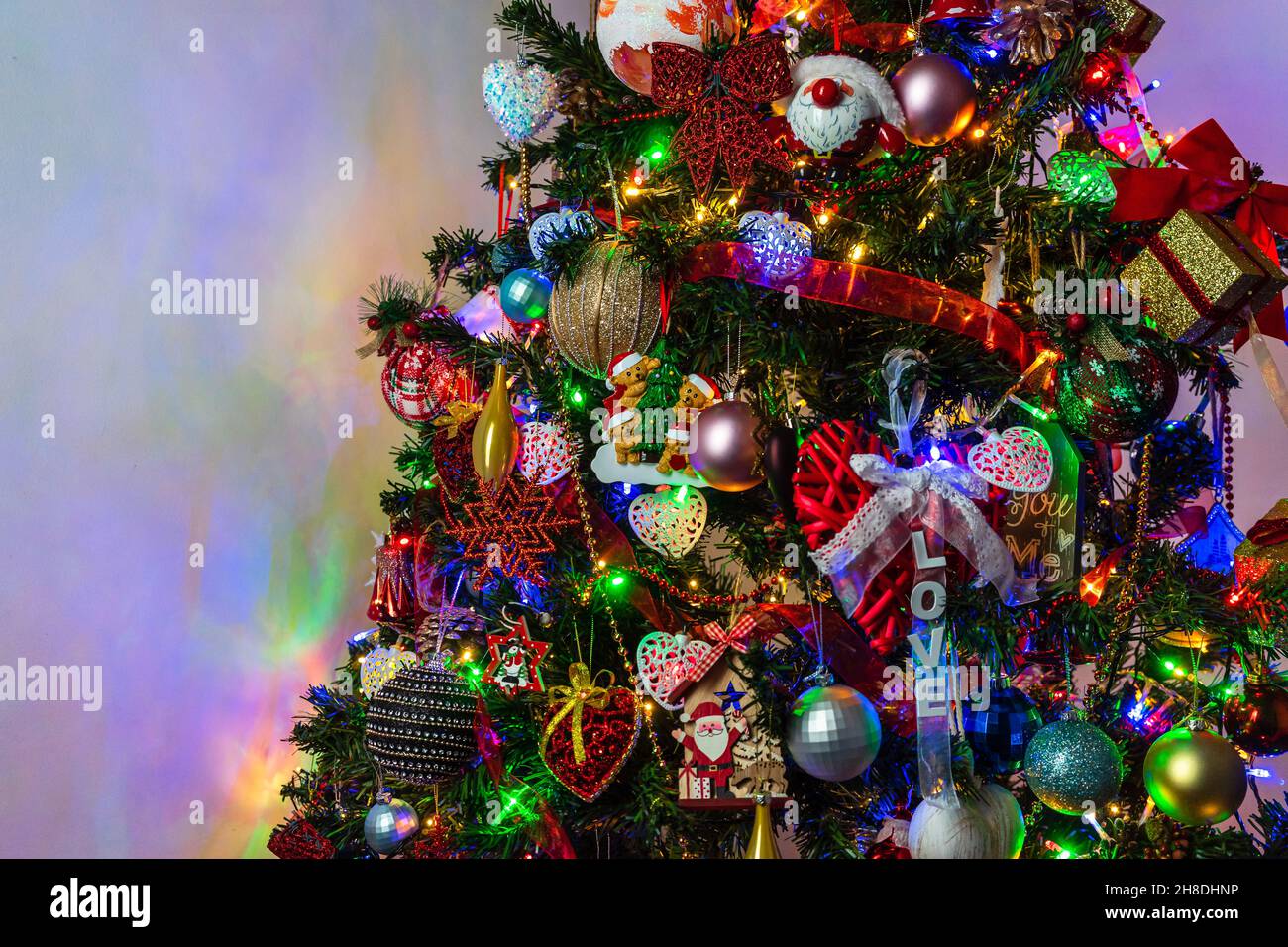 Beautiful Christmas tree with lights and decorations Stock Photo - Alamy