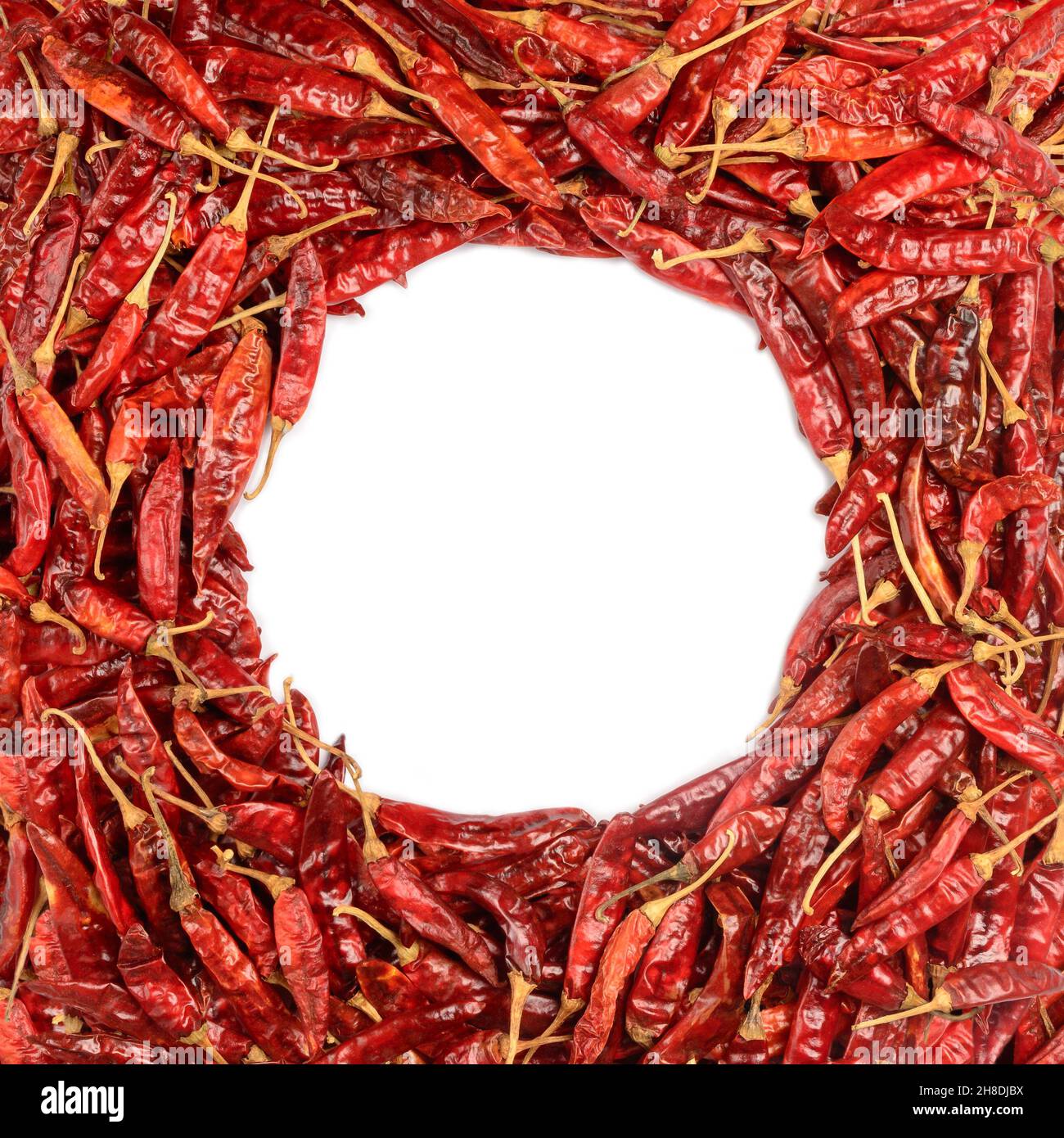 red cayenne pepper, frame made of dry chili, food background with copy ...