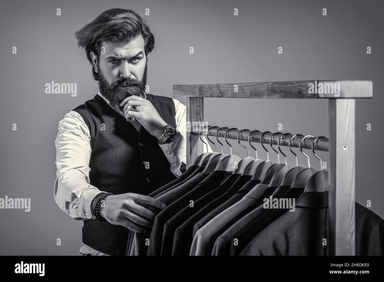 Men clothing, boutiques. Tailor, tailoring. Stylish men's suit. Man ...