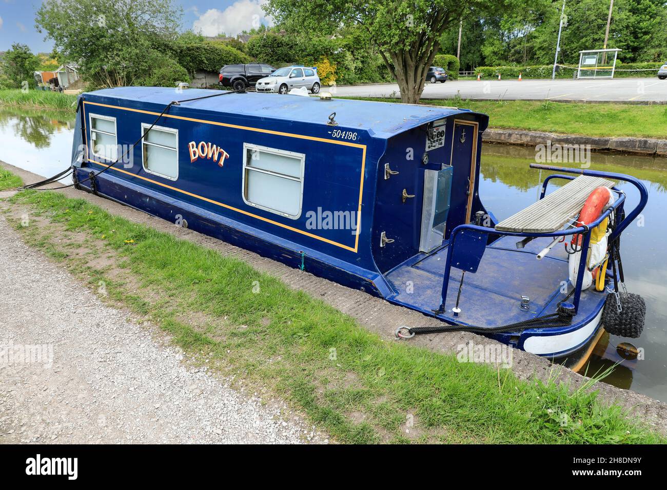 A very small narrowboat or barge named 'Bowt' on the Trent and Mersey ...