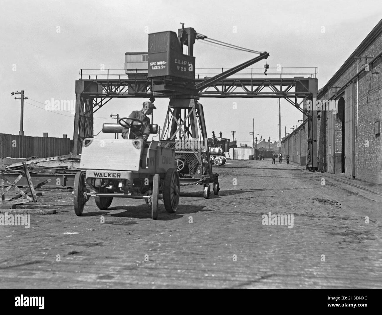 Early battery powered transport – here a Walker truck is towing a small ...