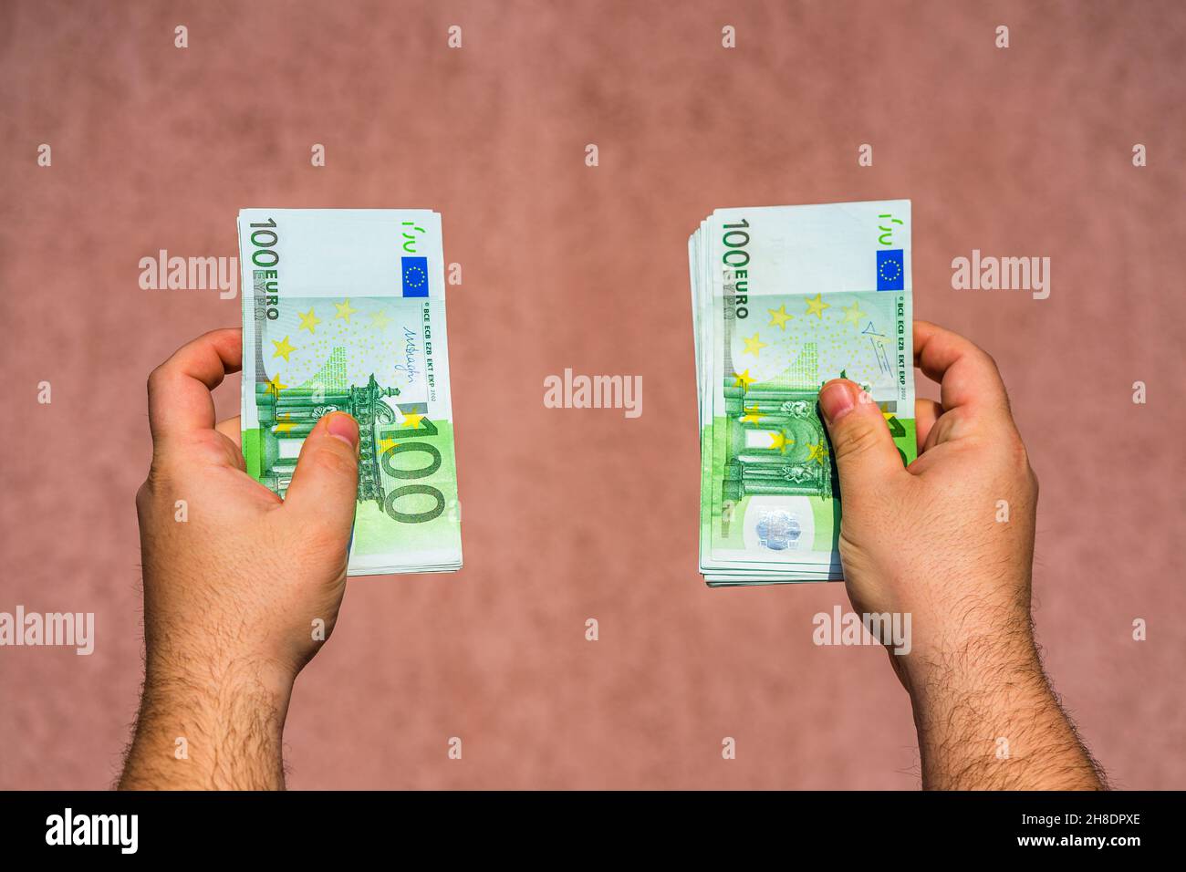 Hand holding and showing euro money or giving money. World money ...