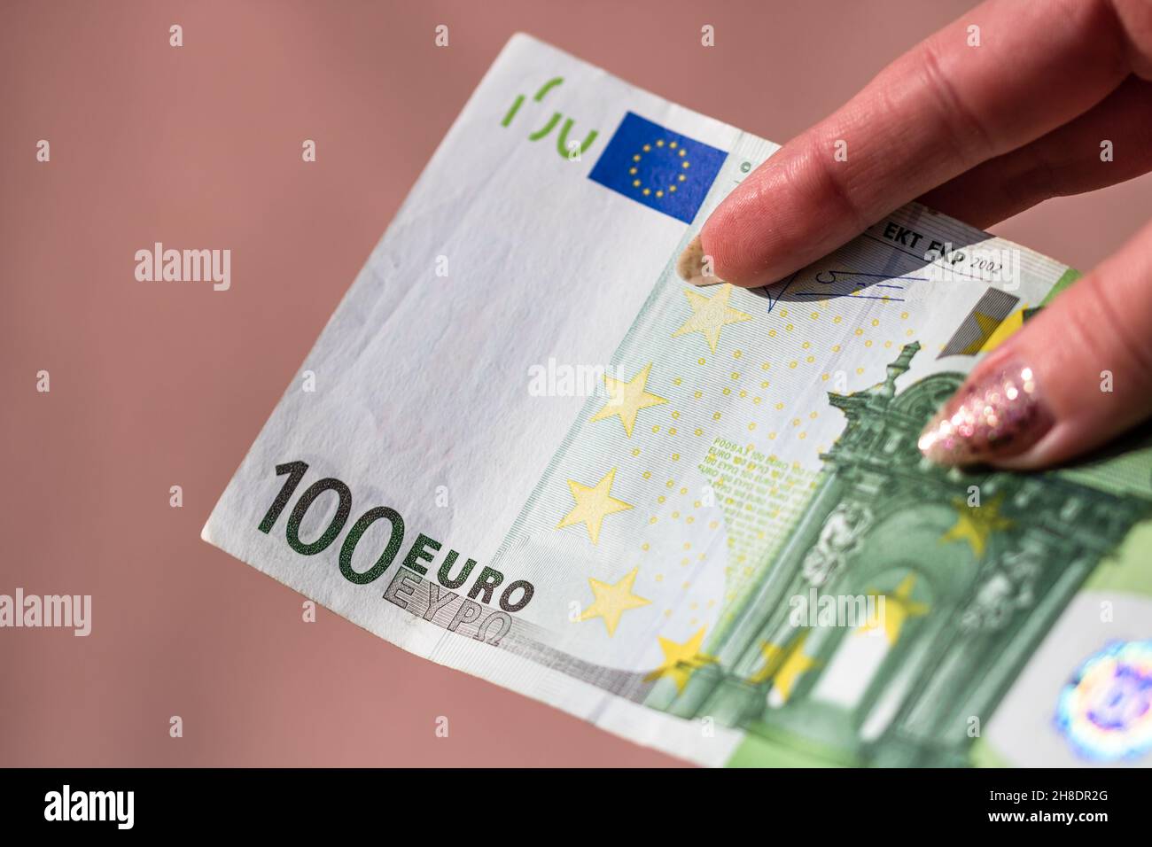 Selective focus on detail of EURO banknotes. Counting or giving EURO ...