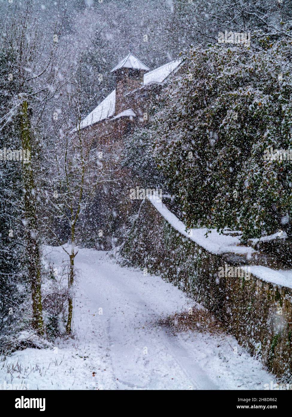 Snow covered landscape at St John's Chapel in Matlock Bath in the ...