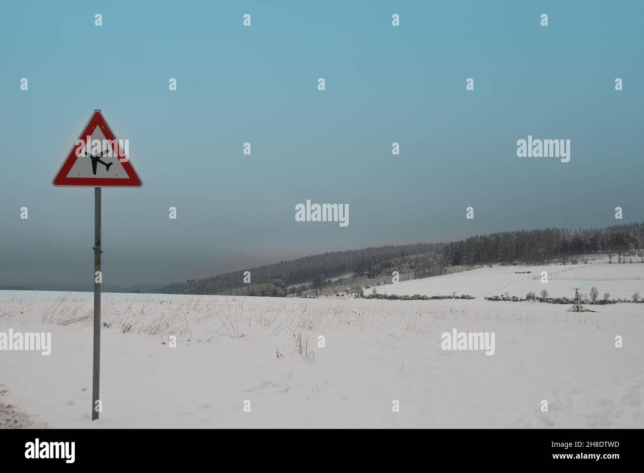 Flight warning sign at winter Stock Photo - Alamy