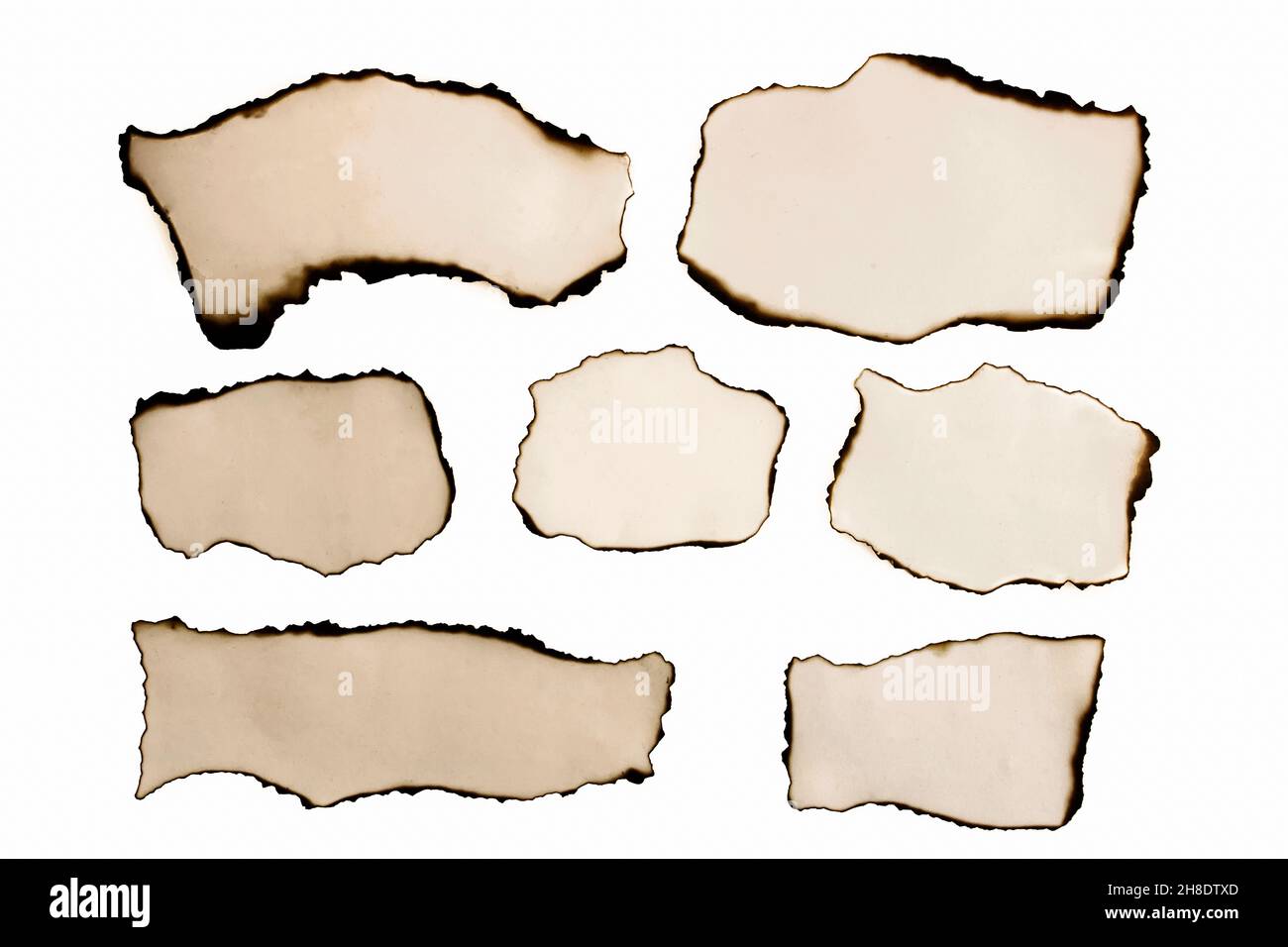 Collection of burnt papers isolated on white background. Banner. Copy ...