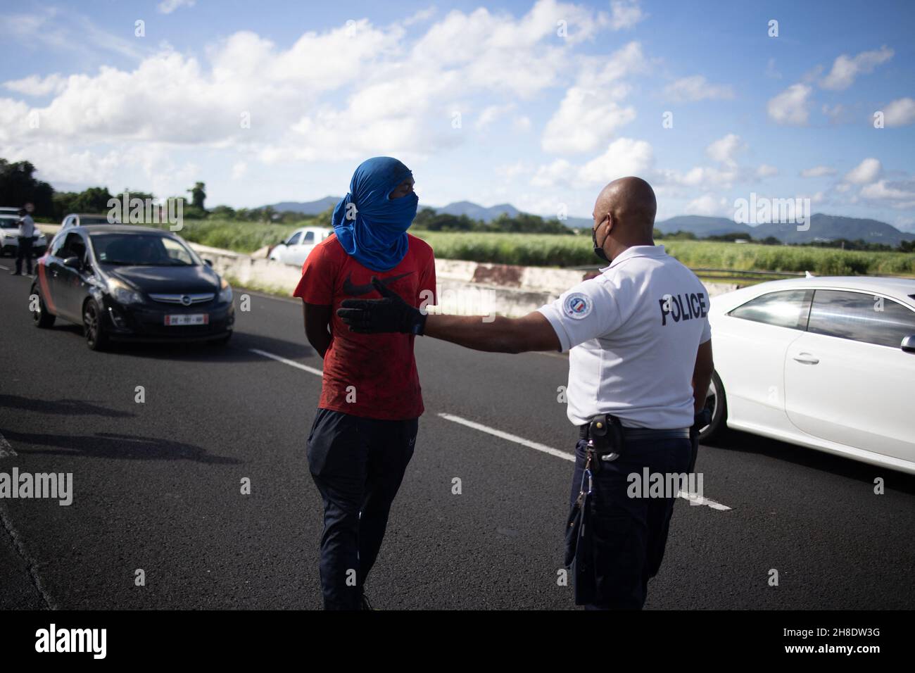 Police forces stops a barricade on the highway next to the airport in ...