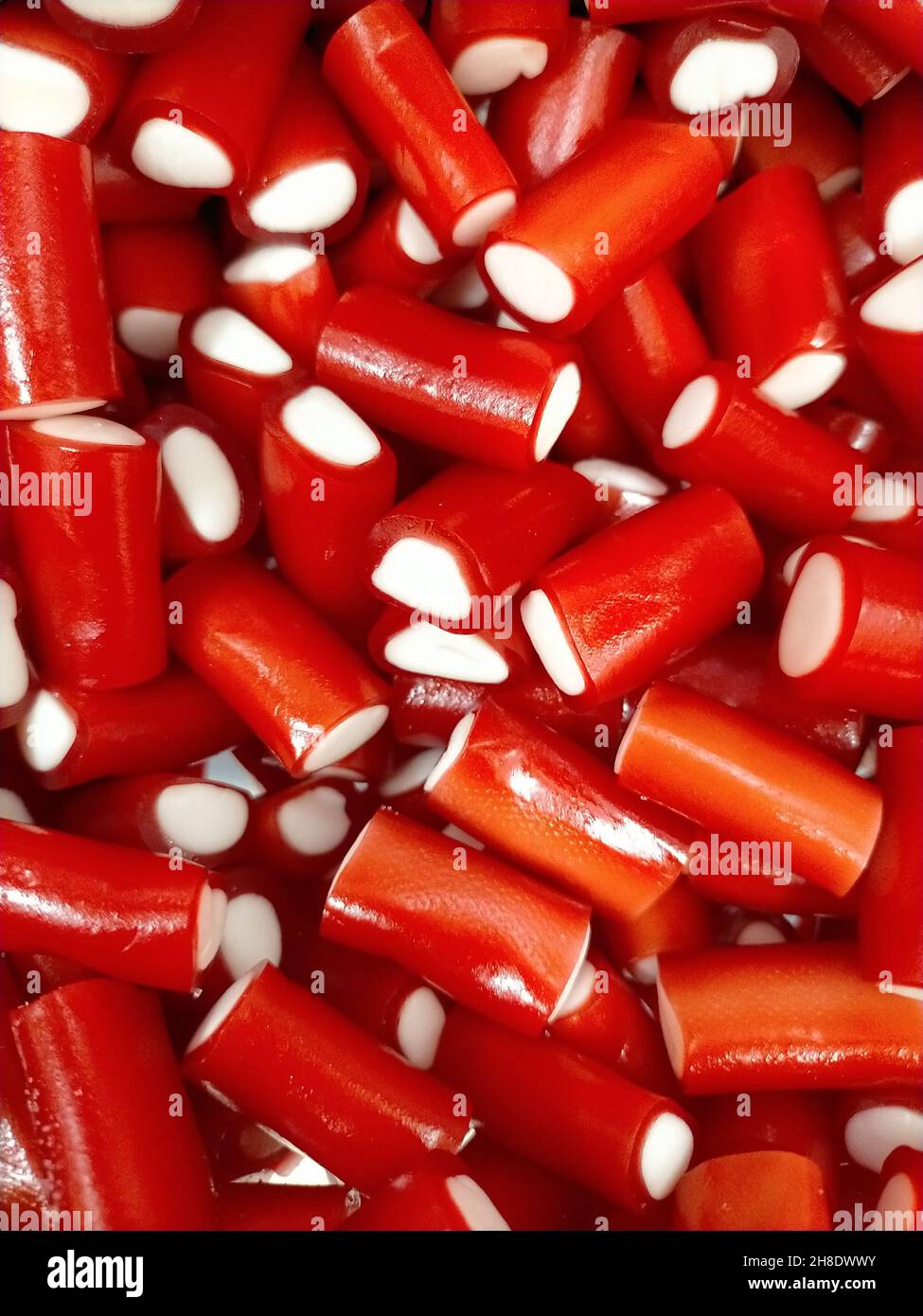 Top view of red and white sweet gummies Stock Photo - Alamy