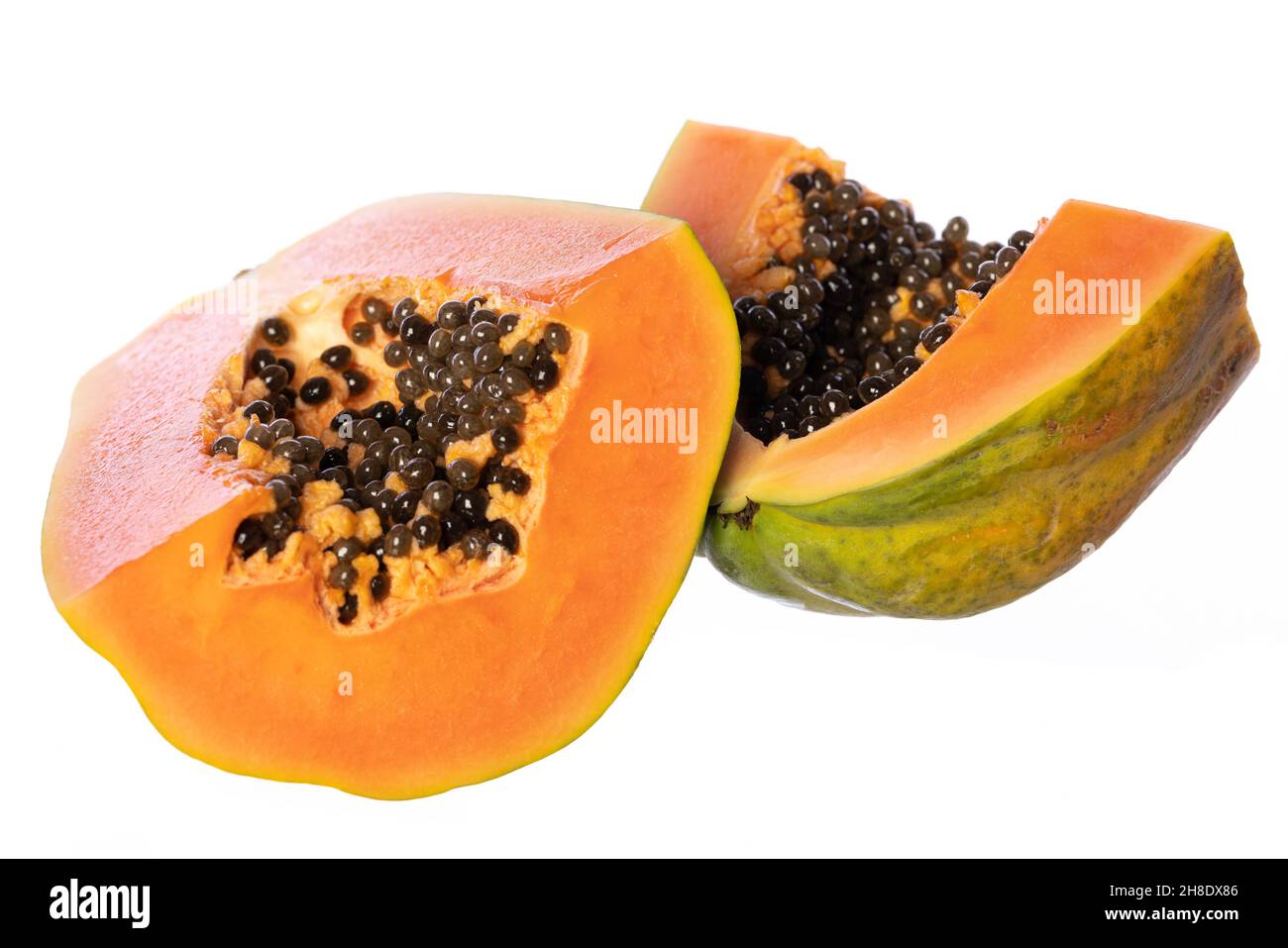 two pieces of papaya isolated on white background Stock Photo - Alamy