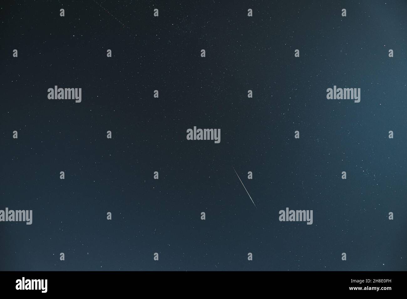 Night Starry Sky With Glowing Stars And Meteoric Track Trail. Meteorite ...