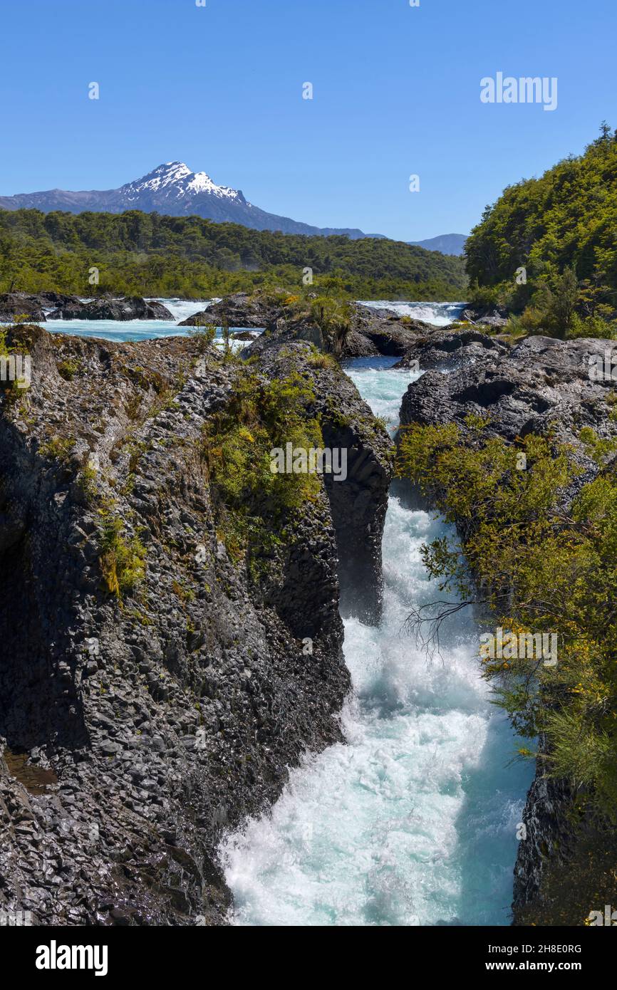 Volcano above a river in southern Chile Stock Photo - Alamy