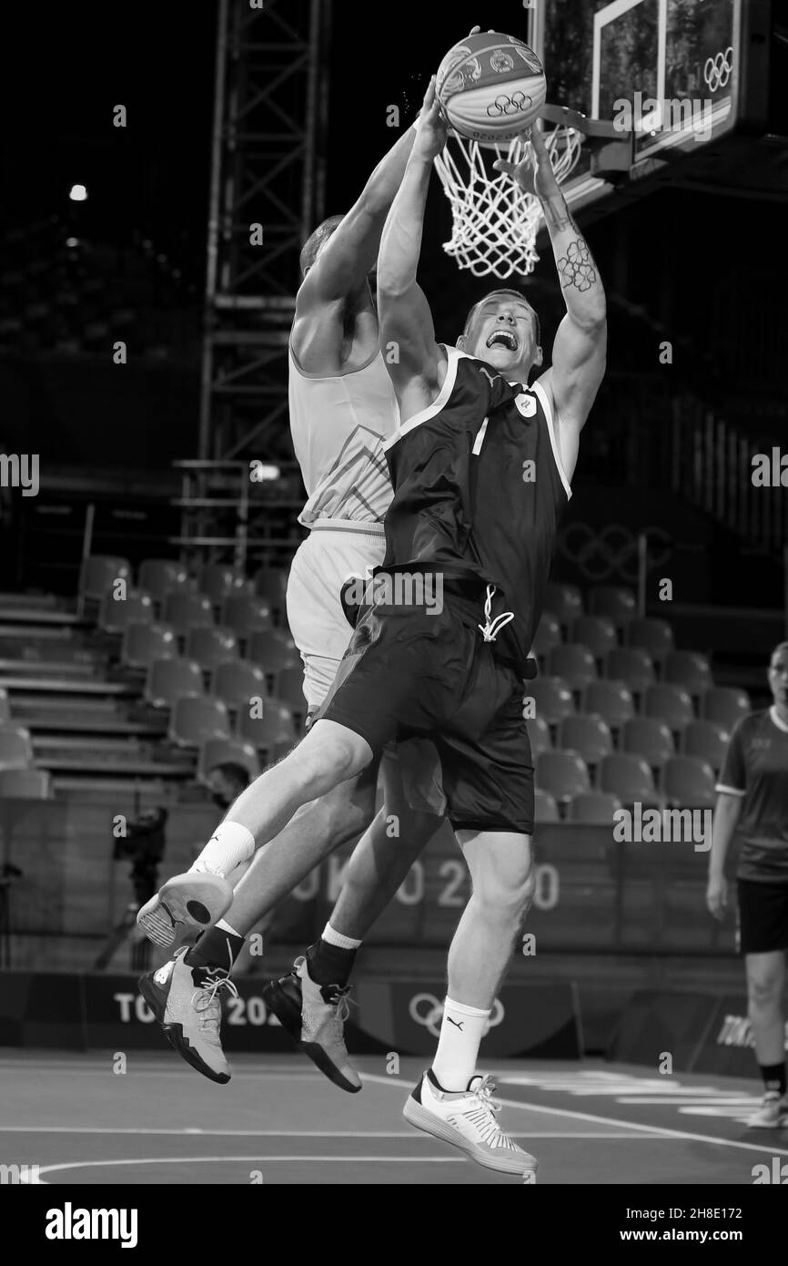 White Basketball Players Dunking