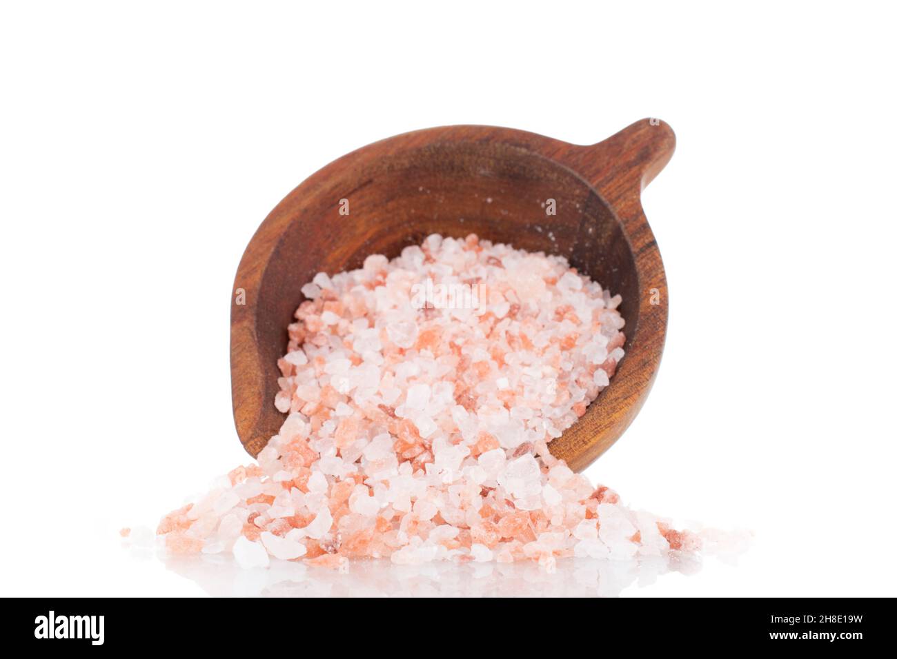 Himalayan salt in a wooden bowl, close-up, isolated on white Stock ...