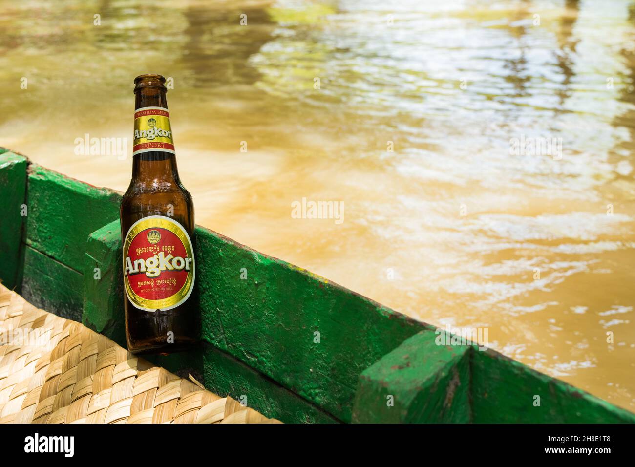 KAMPONG PHLUK, CAMBODIA - Aug 13, 2017: An open glass bottle of Angkor ...