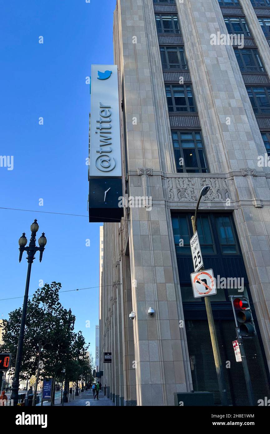 A sign with @twitter hangs from the corner of 1355 Market Street in San ...