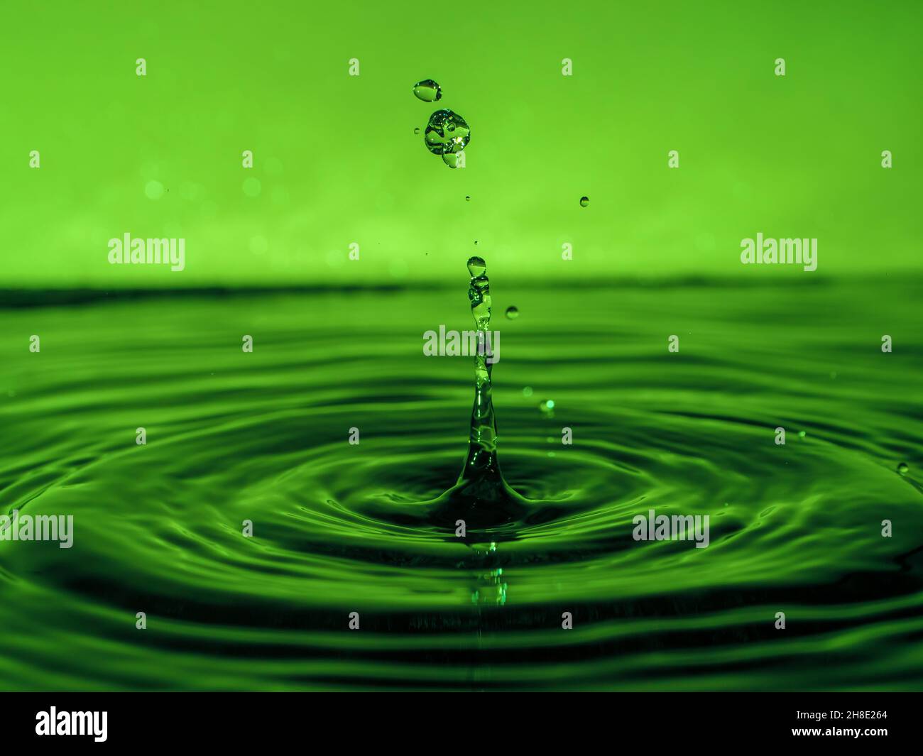 Rain falling on green ocean waves hi-res stock photography and images ...