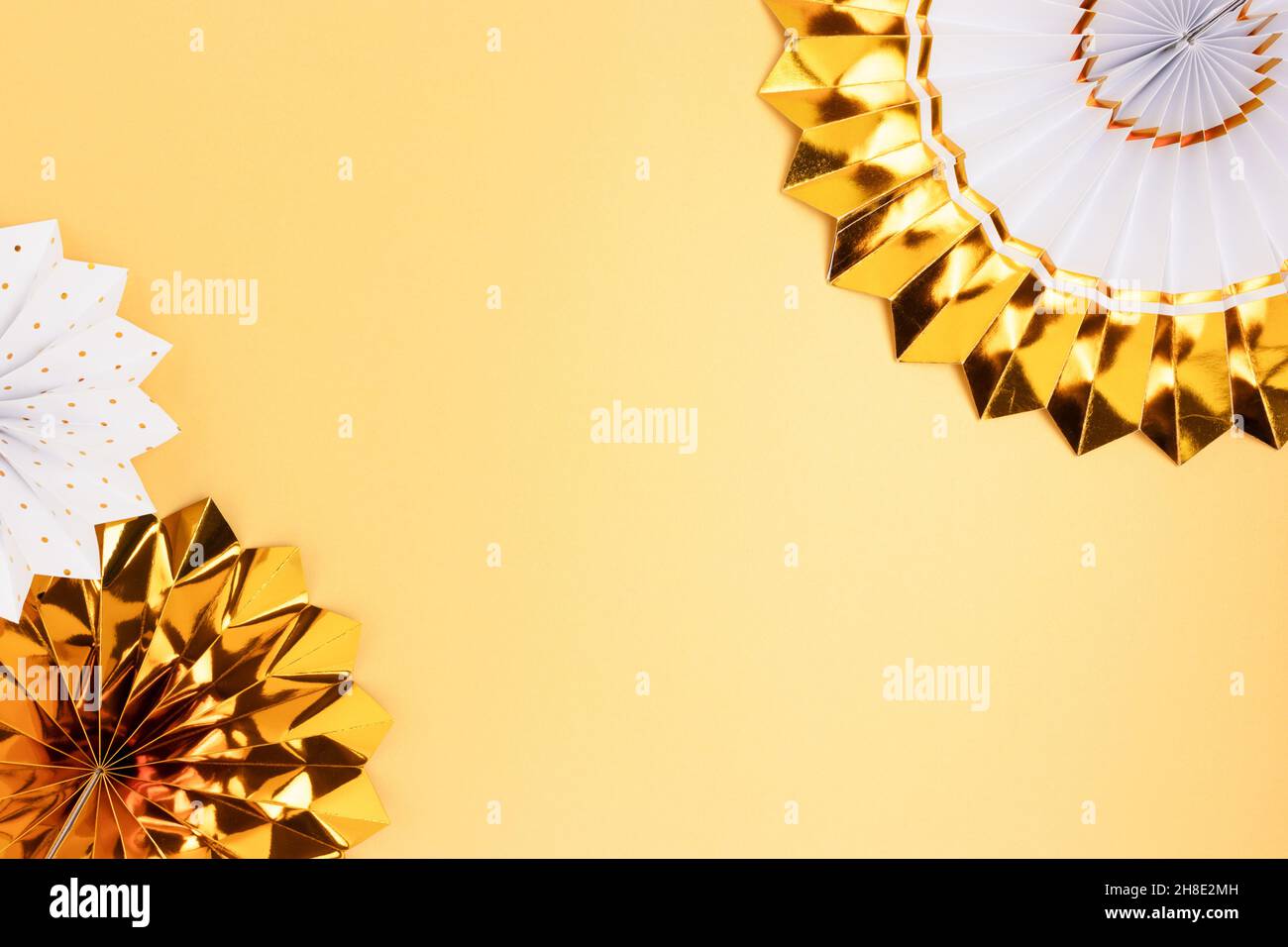 Border frame made of gold colored paper fans with copy space Stock ...