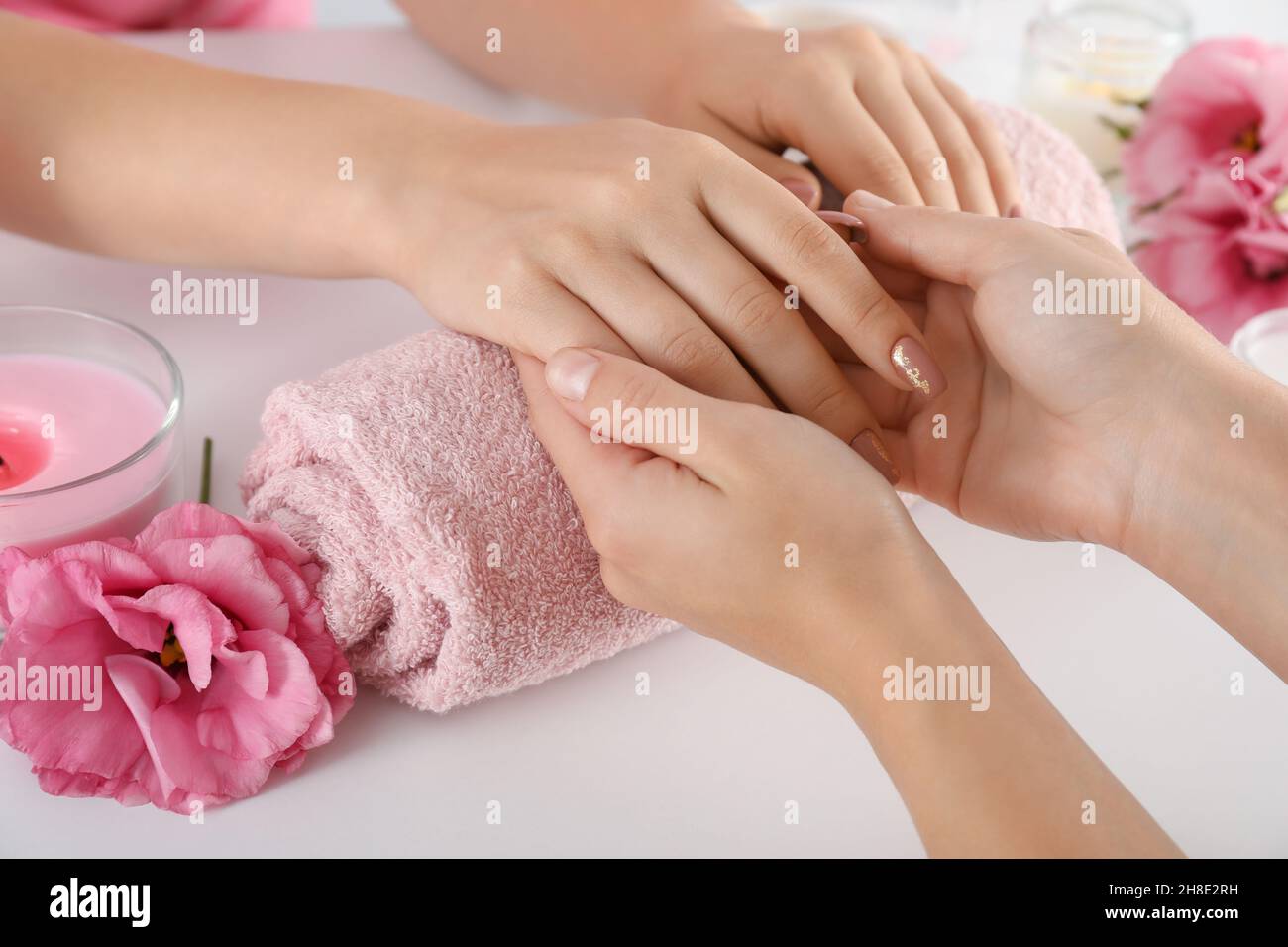 Concept of hand care with cosmetics on white background Stock Photo - Alamy