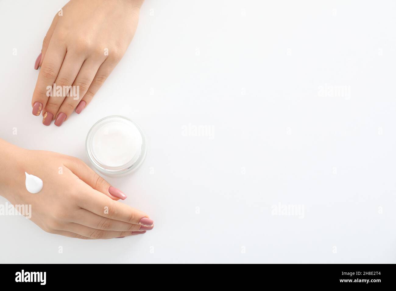 Concept of hand care with cosmetics on white background Stock Photo - Alamy