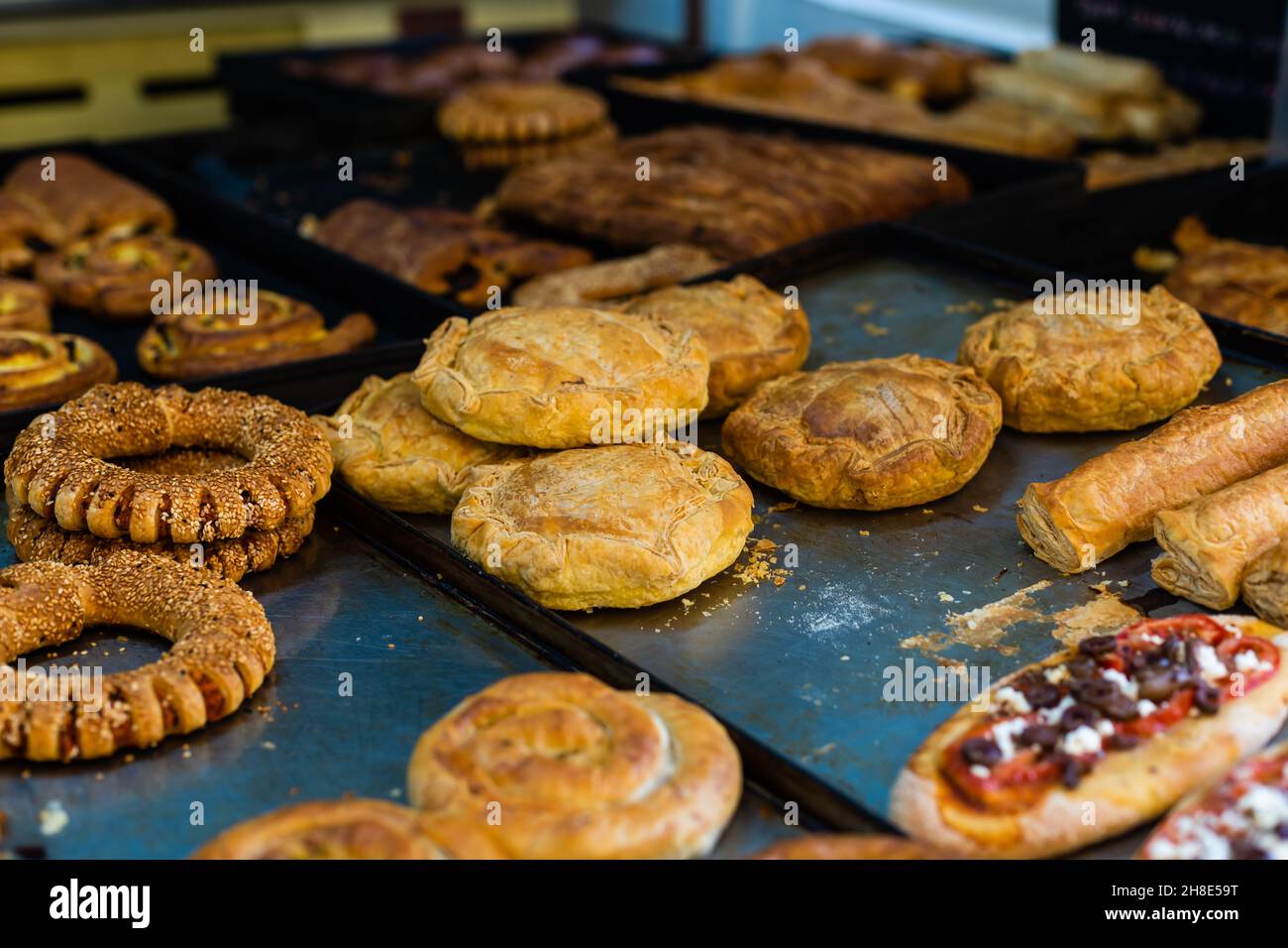 typical Greek sweet street baked goods in a storefront of a Greek ...