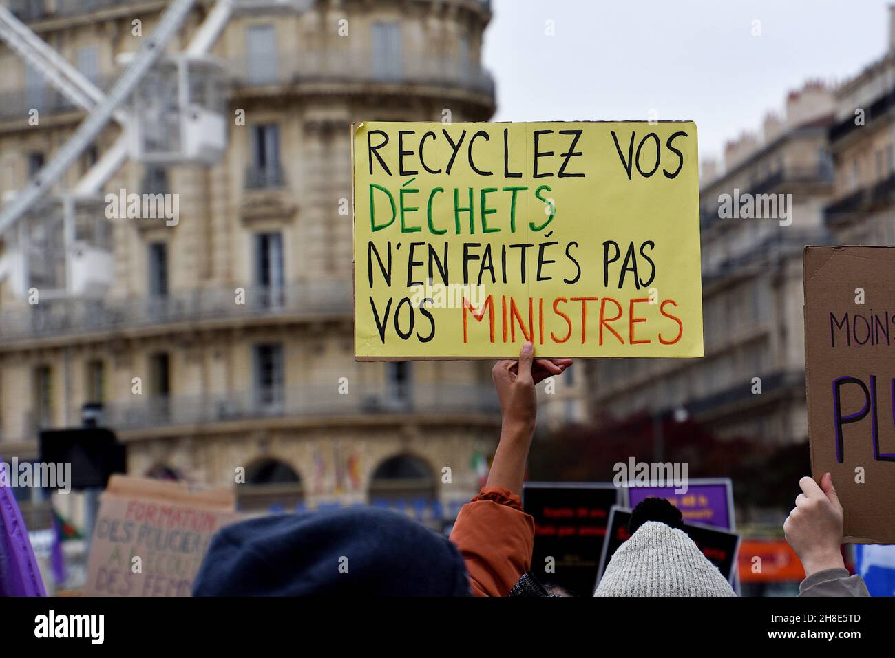 A protester holds a placard expressing her opinion during the ...