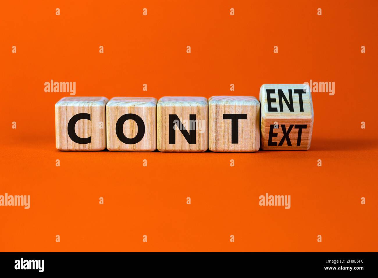 Content and context symbol. Turned a wooden cube and changed the word ...