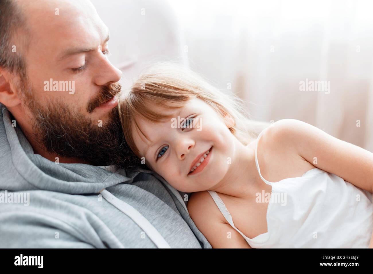 Child on chest hi-res stock photography and images - Alamy