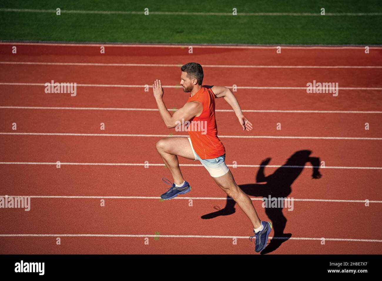 athletic guy run. challenge and competition. marathon speed. sprinter ...