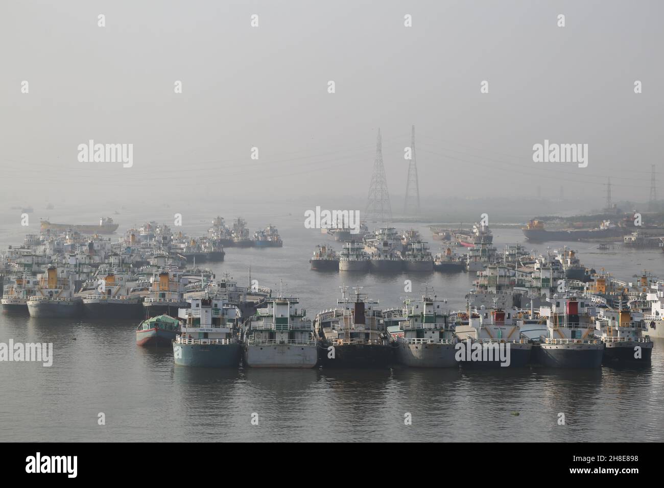 Large ship unloading raw materials hi-res stock photography and images ...